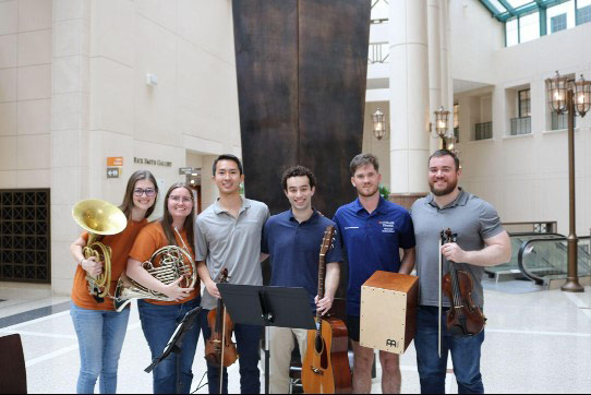 Members of The Devonshires after a performance